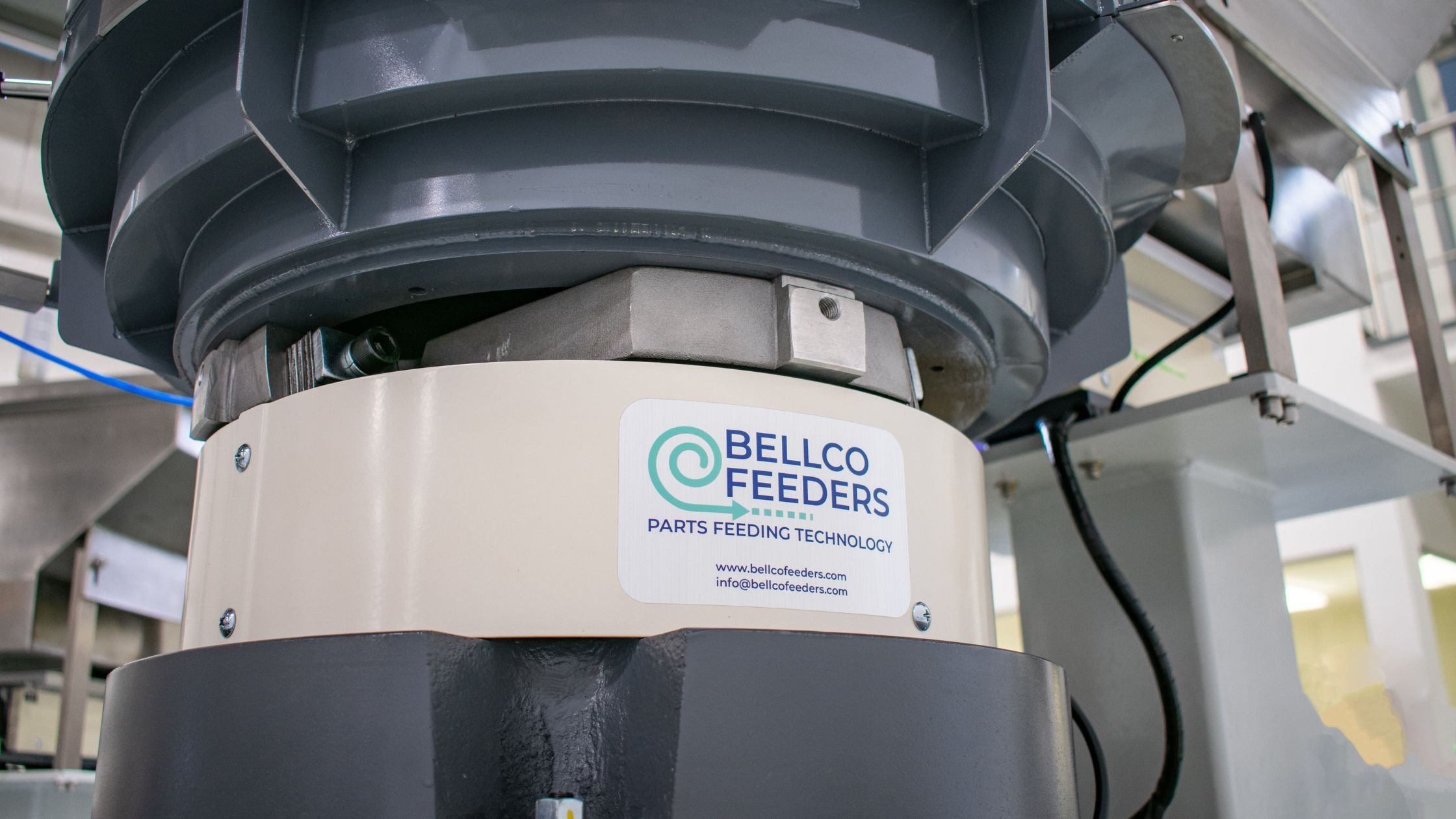 Plastic Cap Feeding by Bellco Feeders Boosts Productivity