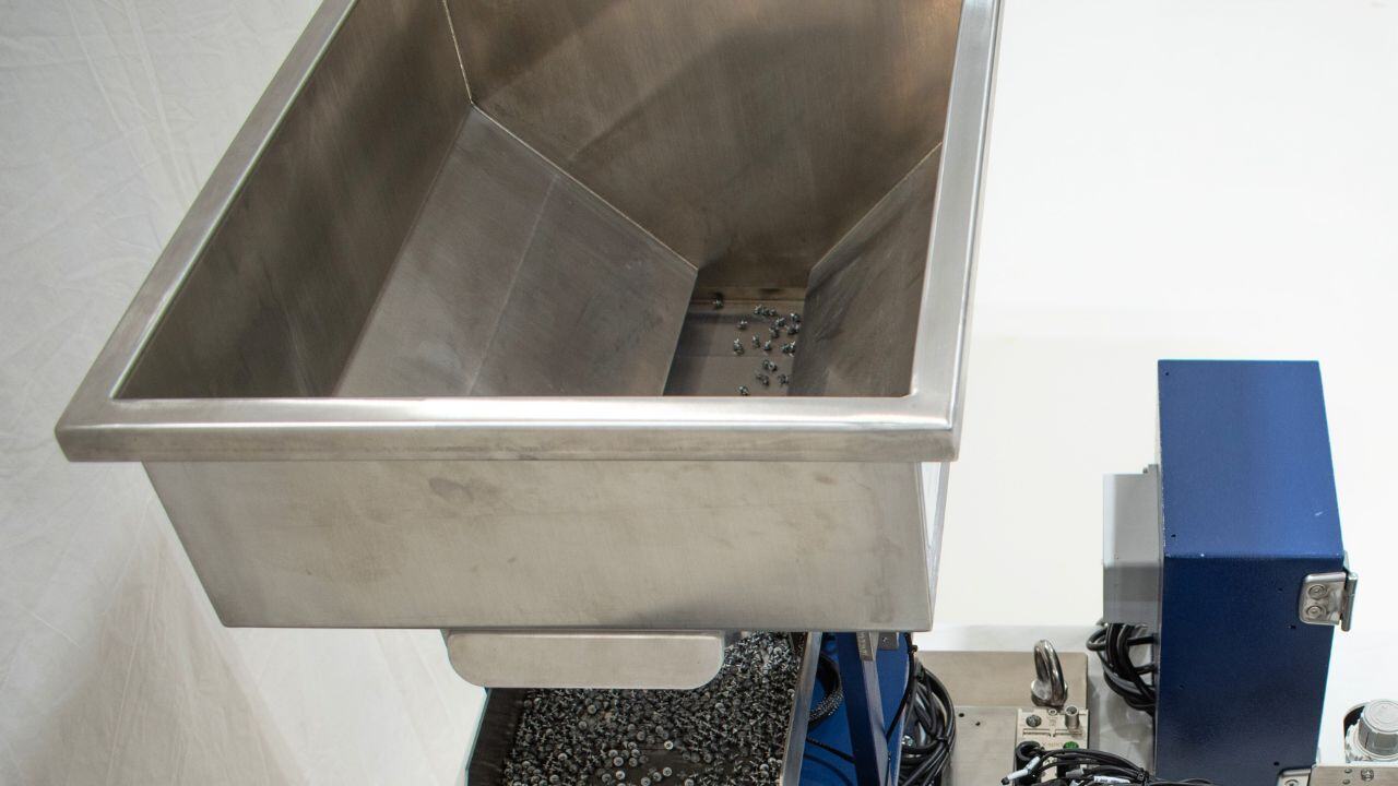 Efficient Button Insert Feeding: A Bellco Vibratory Bowl Case Study